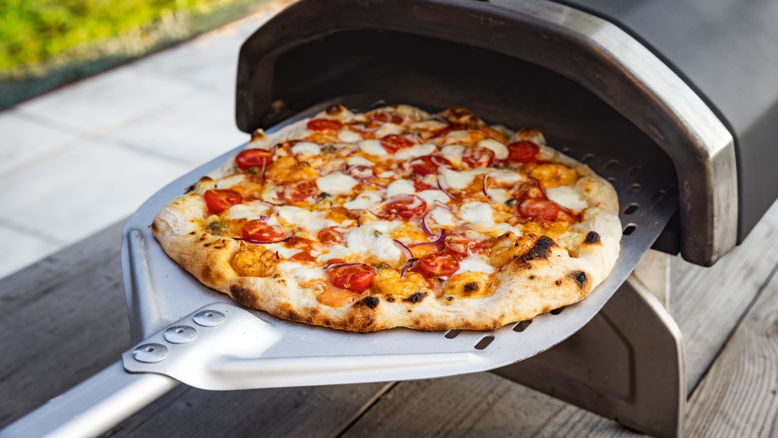 how to cook frozen cooked pizza